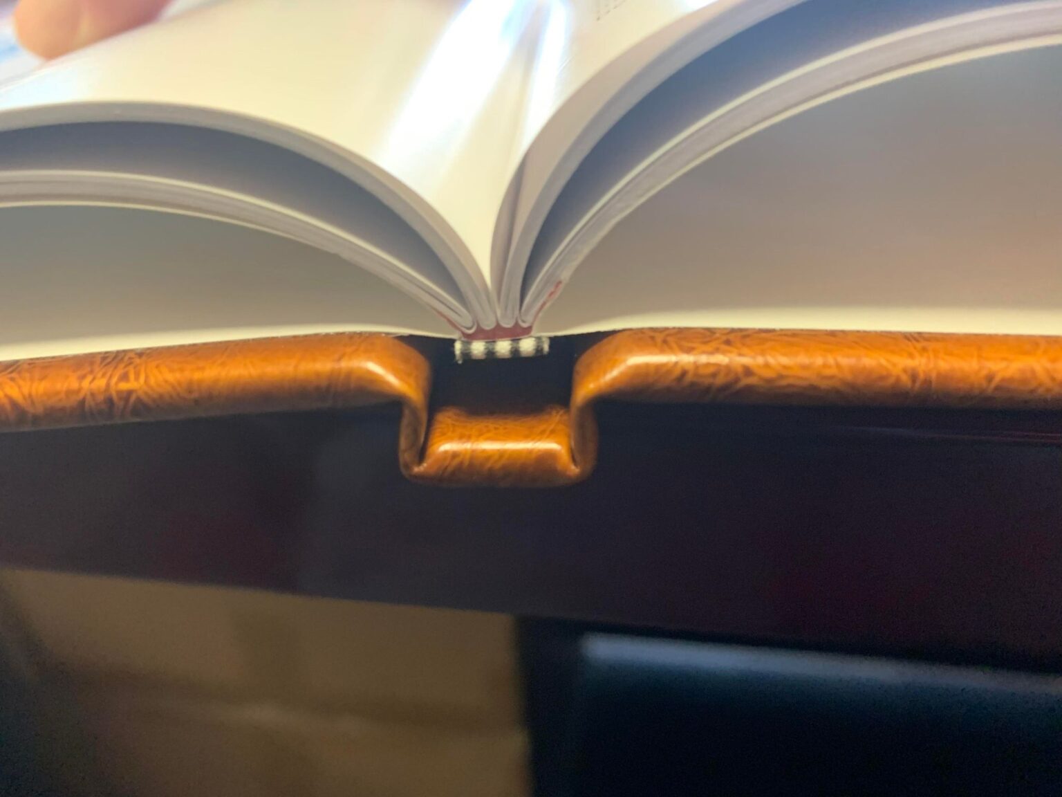 Smyth Sewn vs. Glue Bound Hardcover Books: What’s the Difference? - Sure Print & Design
